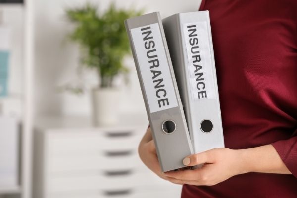 Couple of insurance log books - HAW LAW